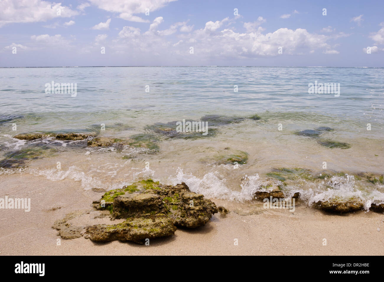 Wave crashing on rocks on the beach, Mauritius Stock Photo - Alamy
