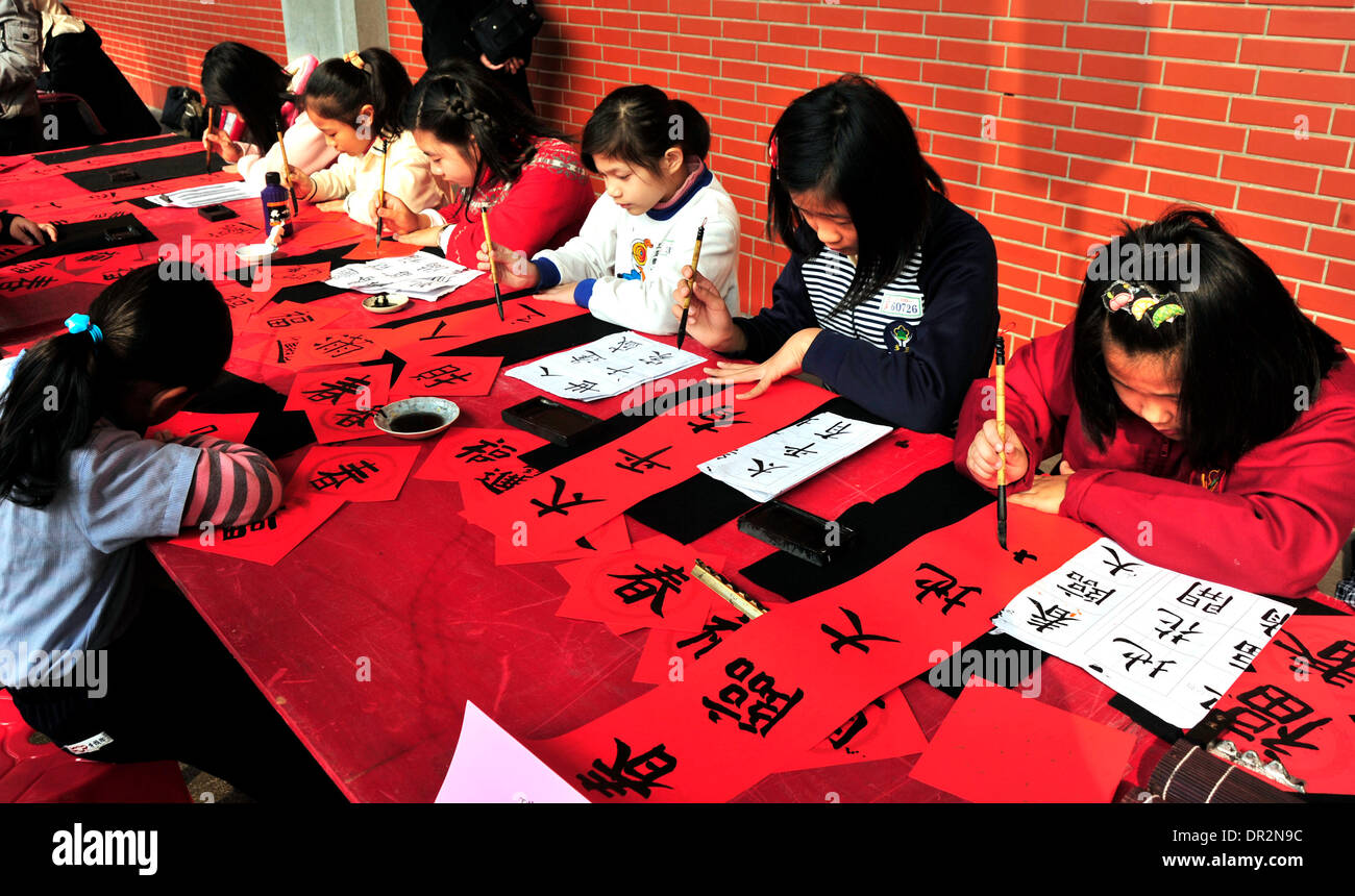 Taipei, China's Taiwan. 18th Jan, 2014. Children create handwriting ...