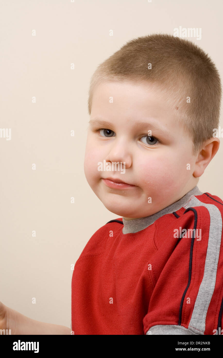 portrait of little boy in red shirt Stock Photo - Alamy