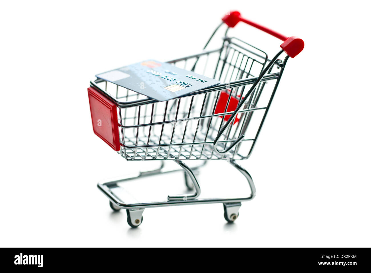shopping cart with credit card on white background Stock Photo - Alamy
