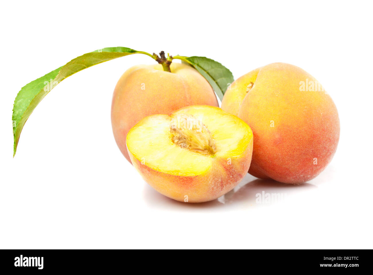 Peach with green leaves from tree isolated on white background Stock ...