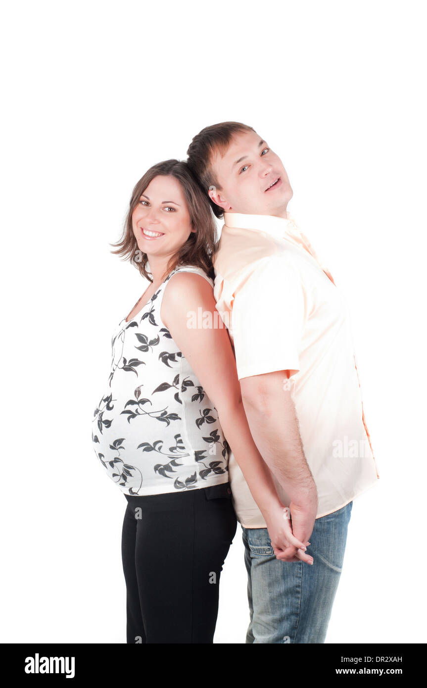 Two standing back to back Stock Photo - Alamy