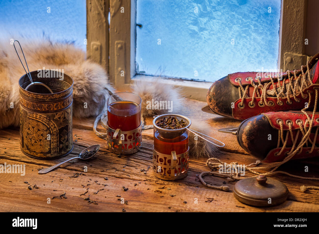 Warm leaf tea served in old-style Stock Photo - Alamy