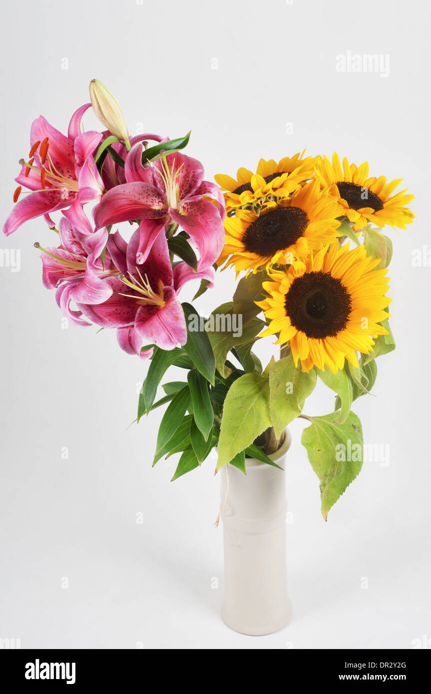 Lily and sunflowersin vase Stock Photo - Alamy