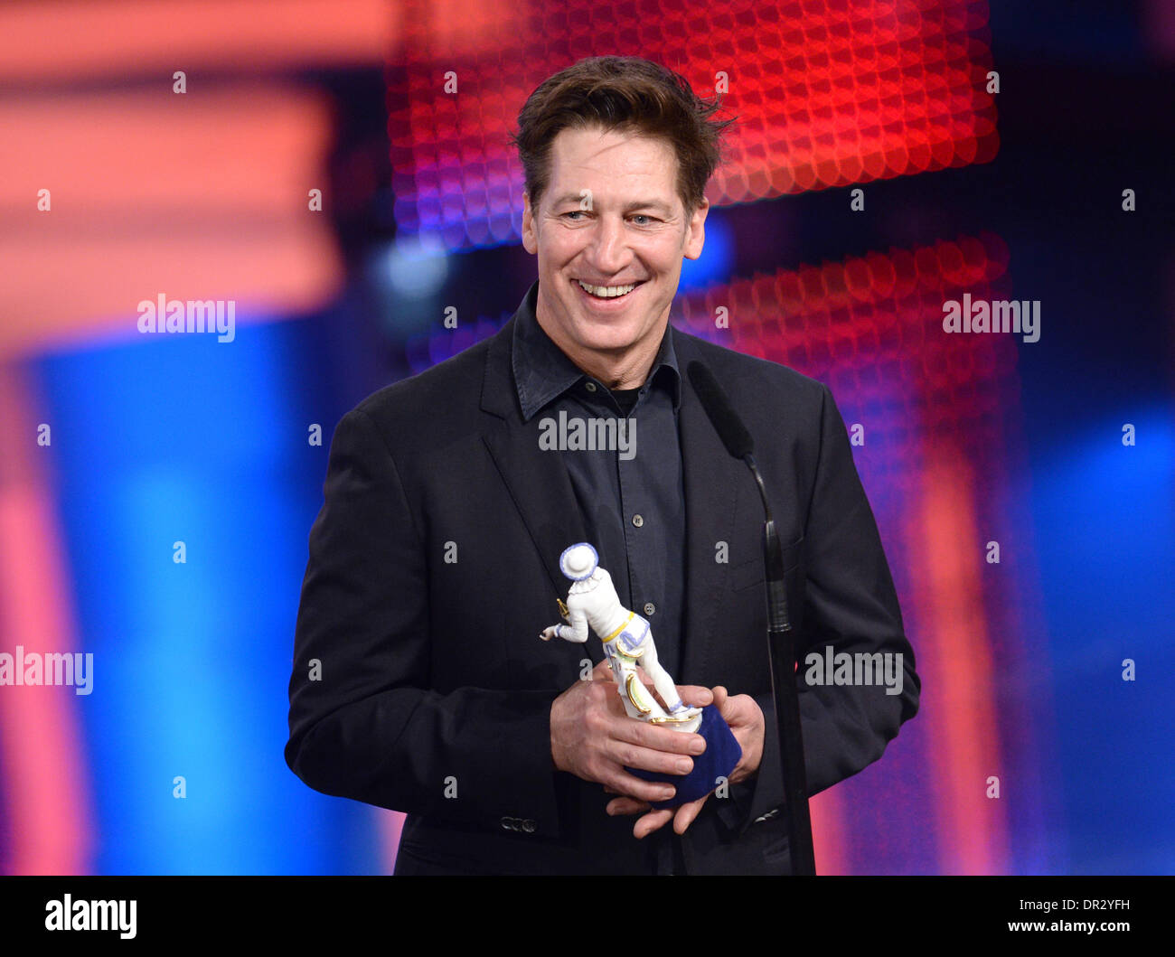 Munich, Germany. 17th Jan, 2014. Actor Tobias Moretti receives the ...