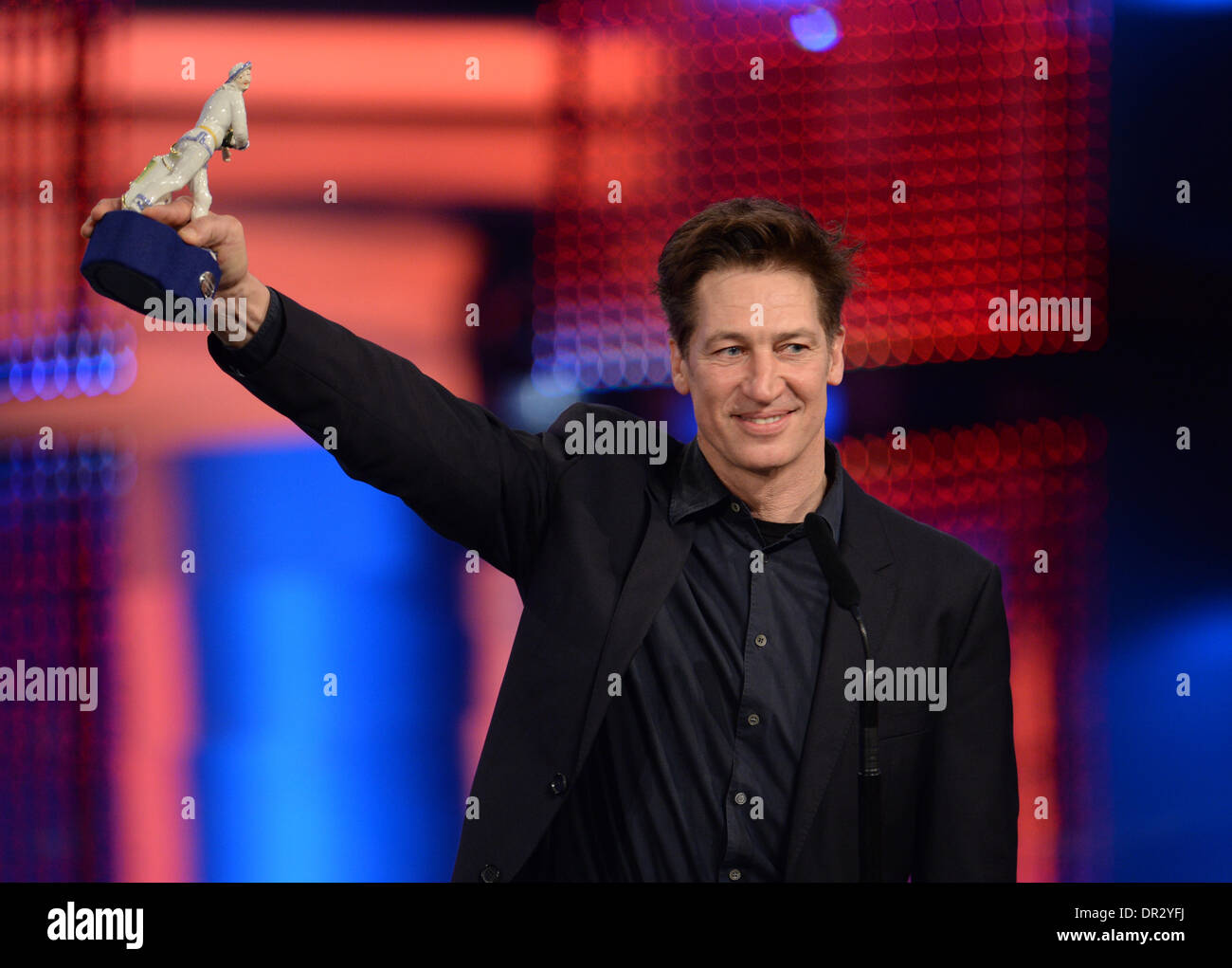 Munich, Germany. 17th Jan, 2014. Actor Tobias Moretti receives the ...