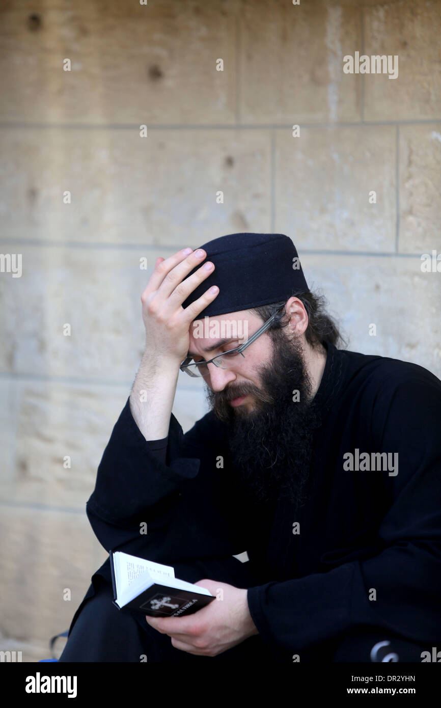 Priest with bible hi-res stock photography and images - Alamy