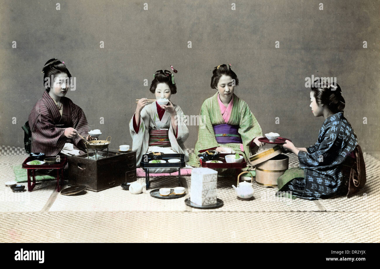 Japanese women eating rice Stock Photo - Alamy