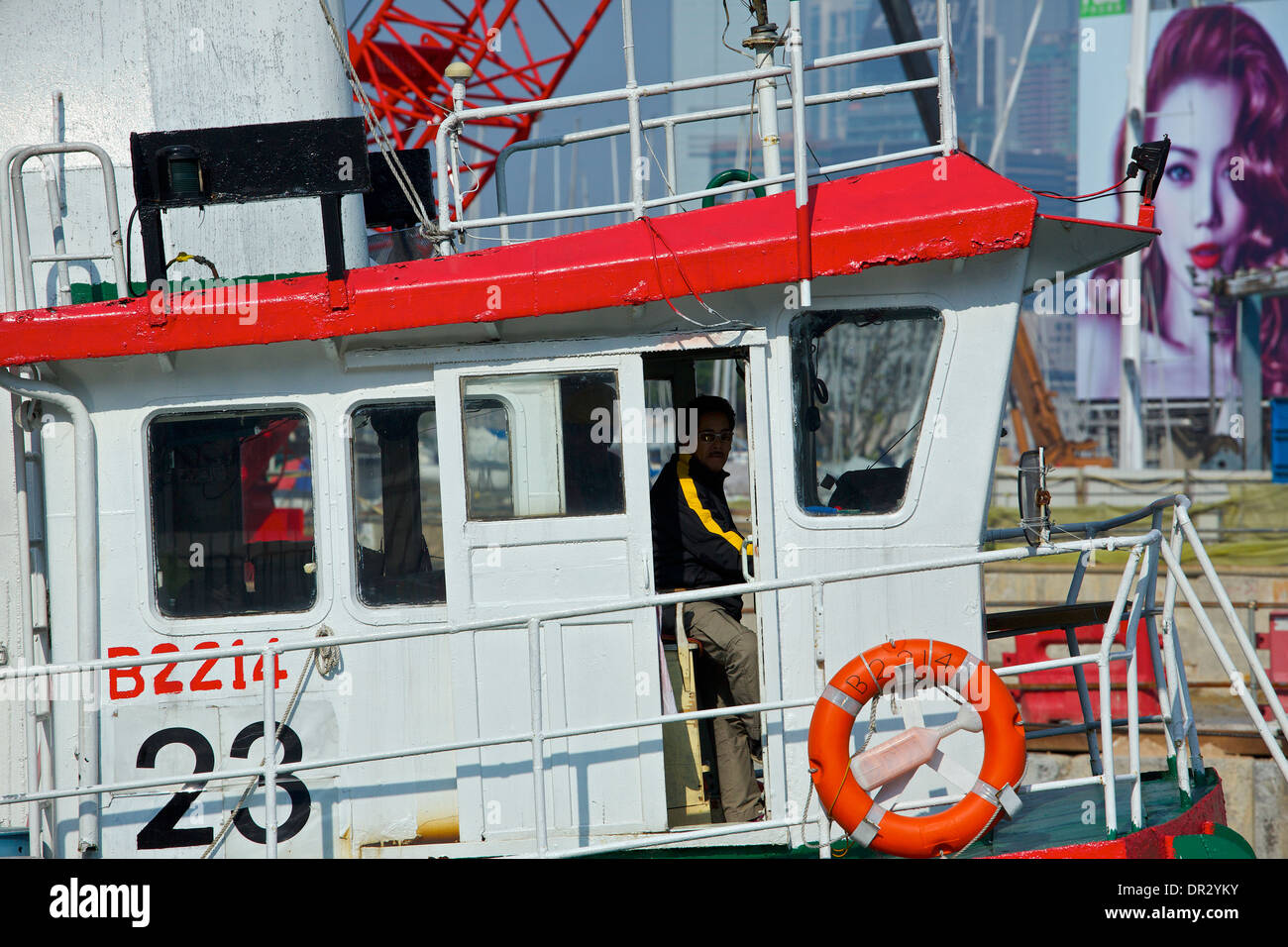 Tug moves a lighter in the Causeway Bay Typhoon Shelter, Hong Kong ...