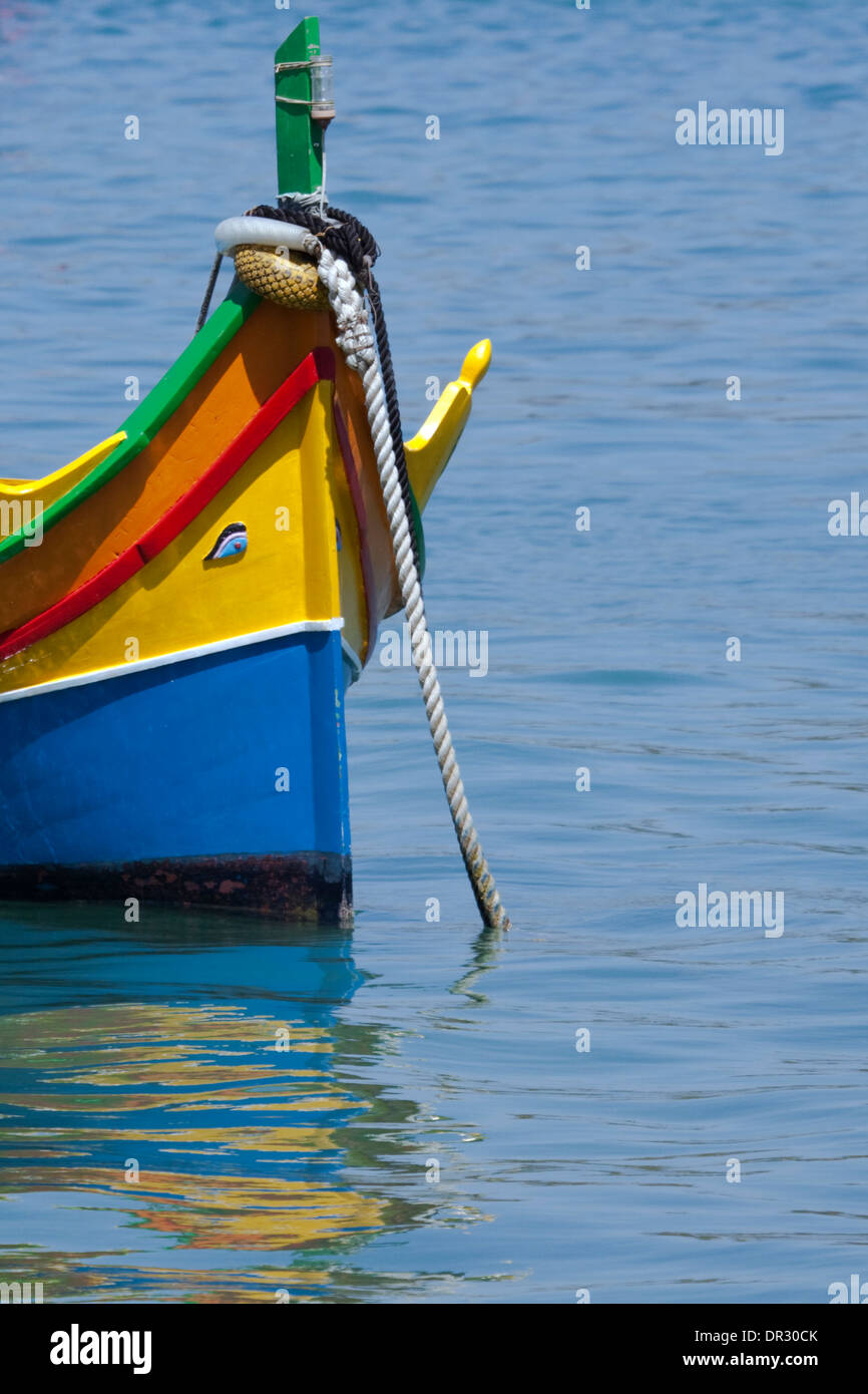 Traditional luzzu fishing boat in Marsaxlokk harbour Stock Photo - Alamy