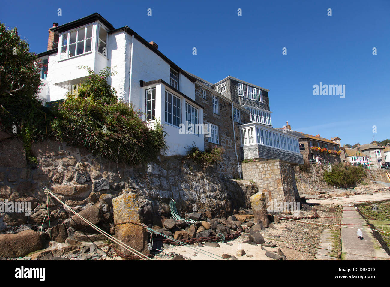 Holiday homes overlooking the harbour at Mousehole, Cornwall, England ...