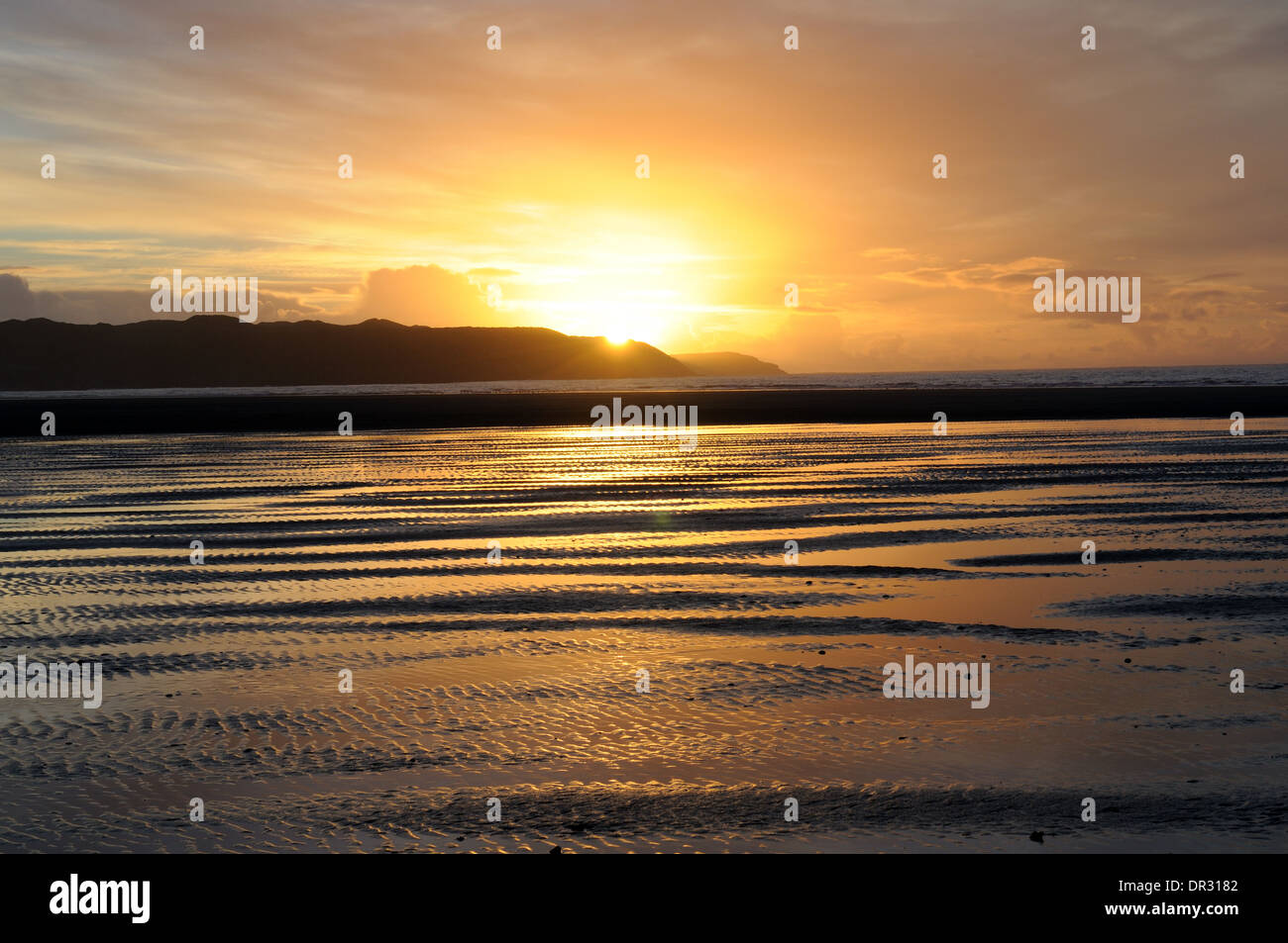 Sunset over Broughton Bay and Burry Holmes from Whitford Sands Gower ...