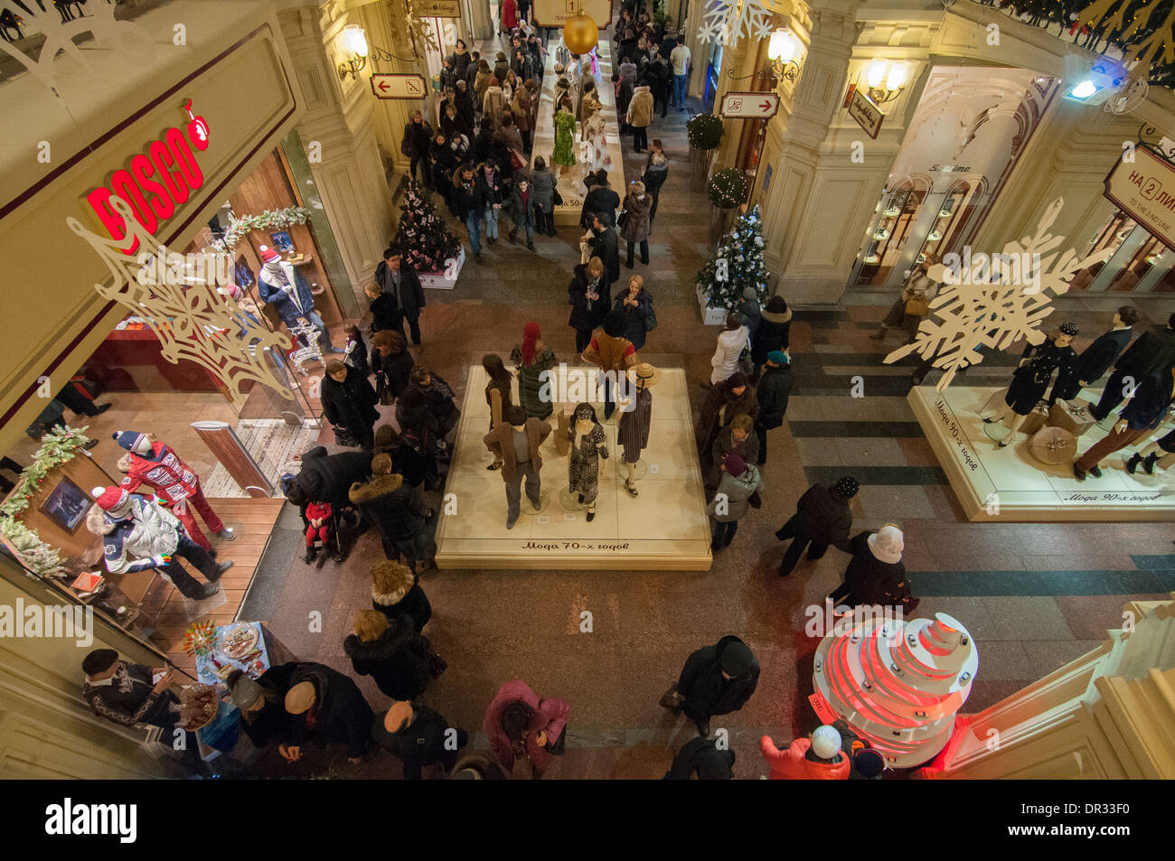 Customers look at soviet fashion in Moscow GUM store Stock Photo - Alamy