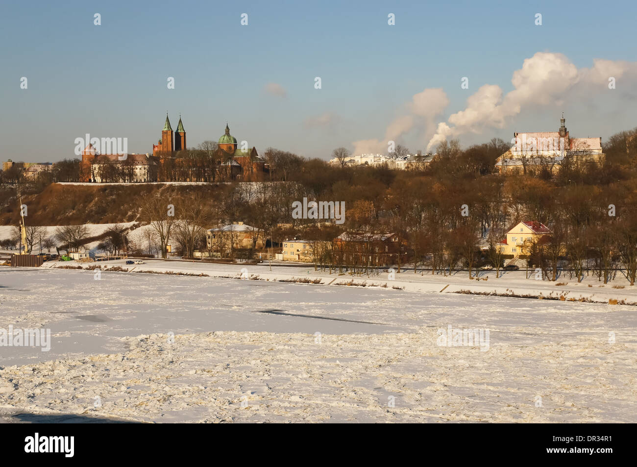 Frozen Vistula river in Plock Poland. View of Plock Cathedral and Tum ...