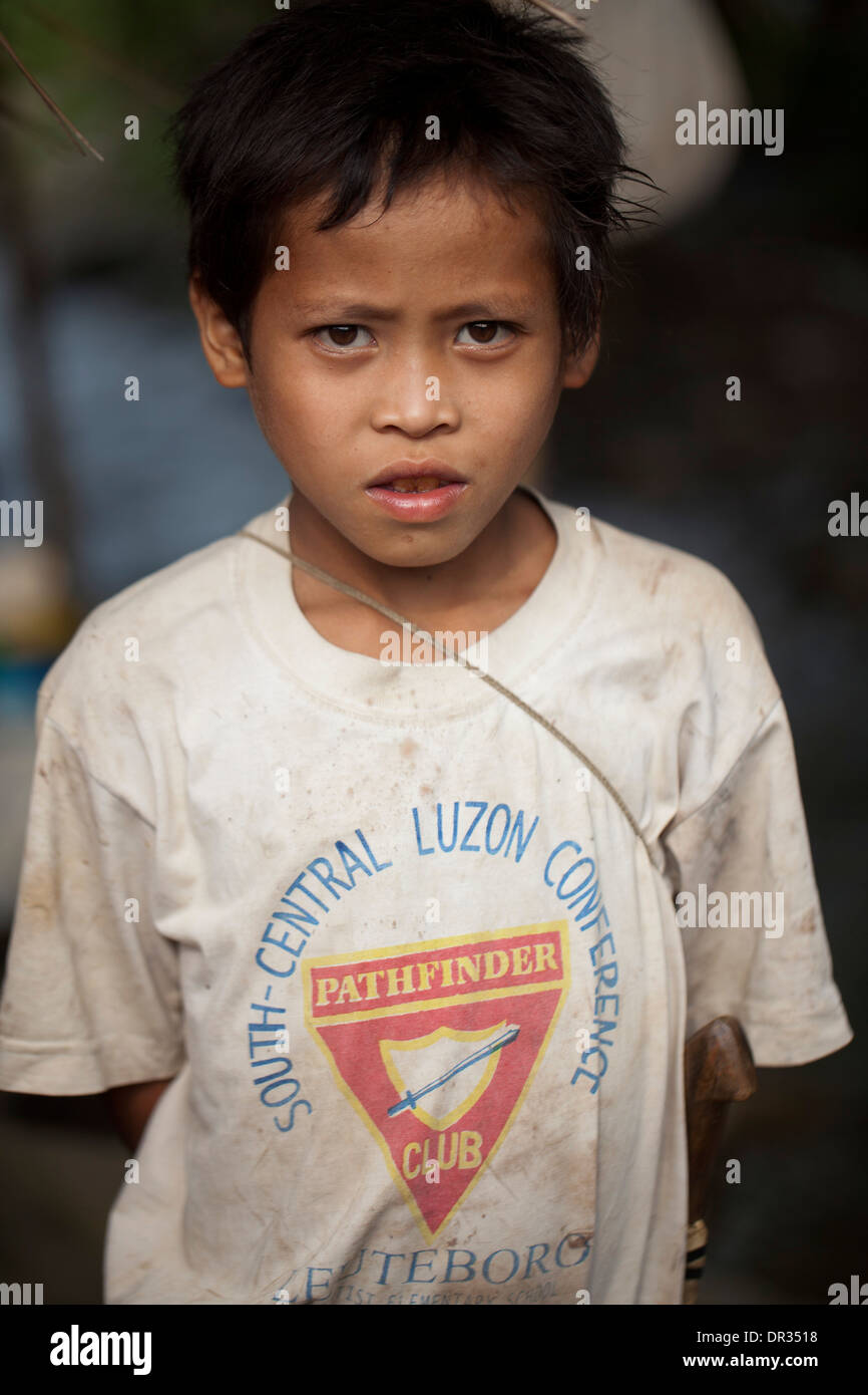 A Hanunoo Mangyan boy attending a Mangyan market near Mansalay ...