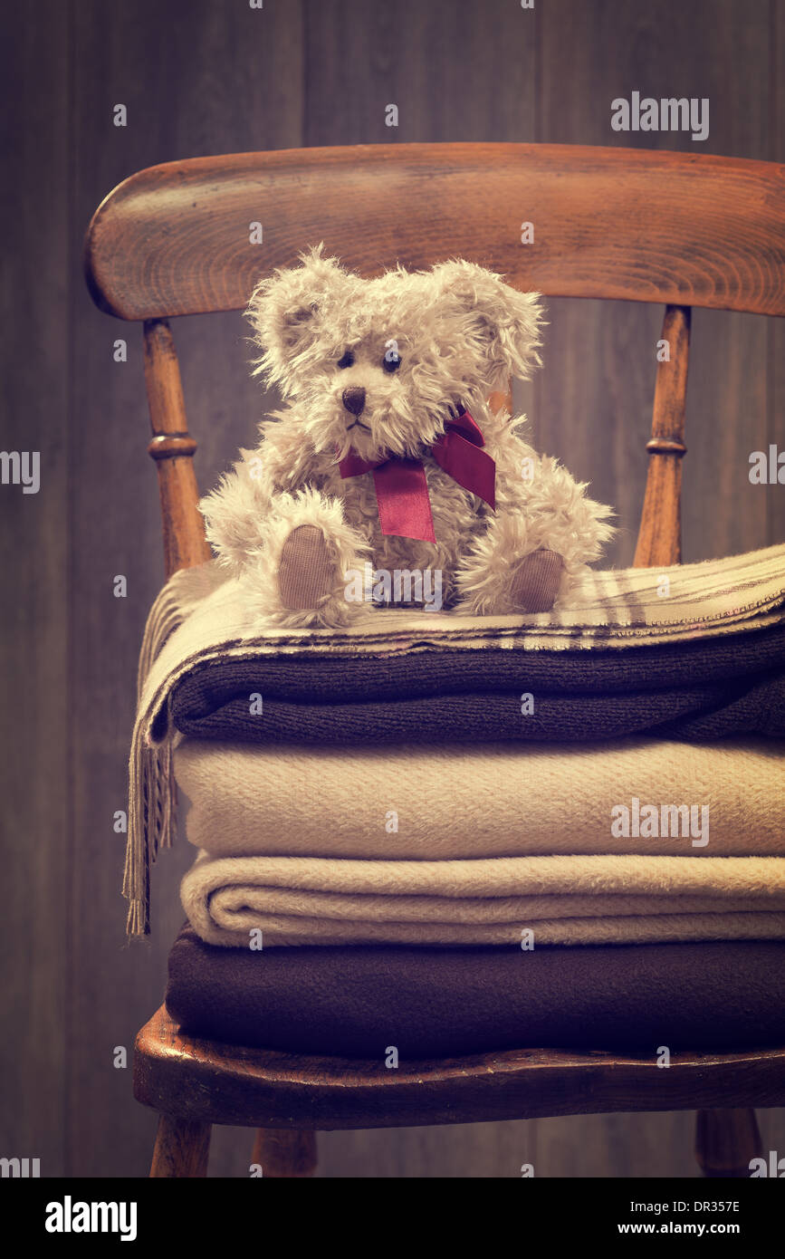 Teddy bear sitting on chair hi-res stock photography and images - Alamy