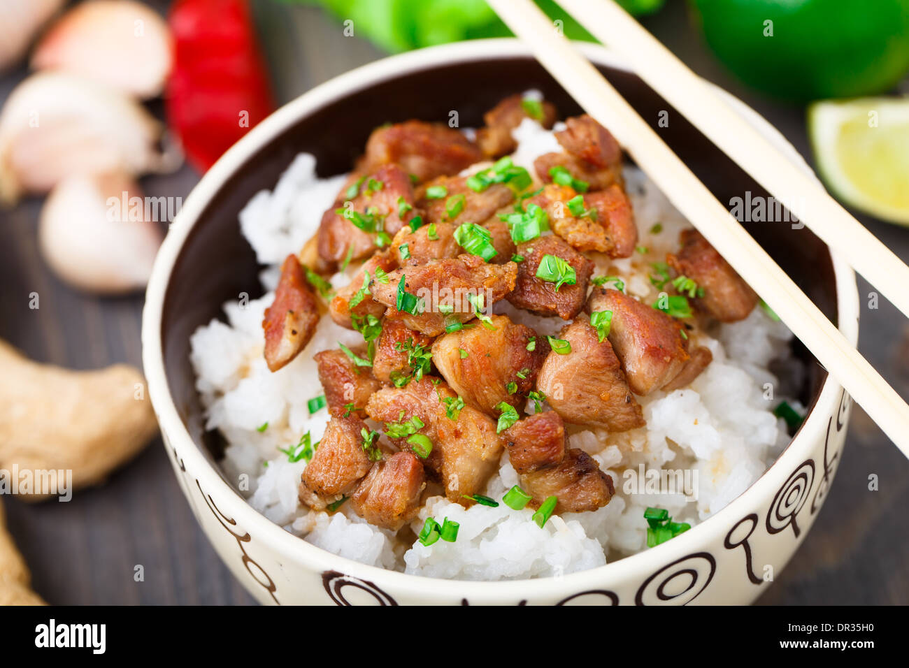 Bowl of rice with meat Stock Photo - Alamy