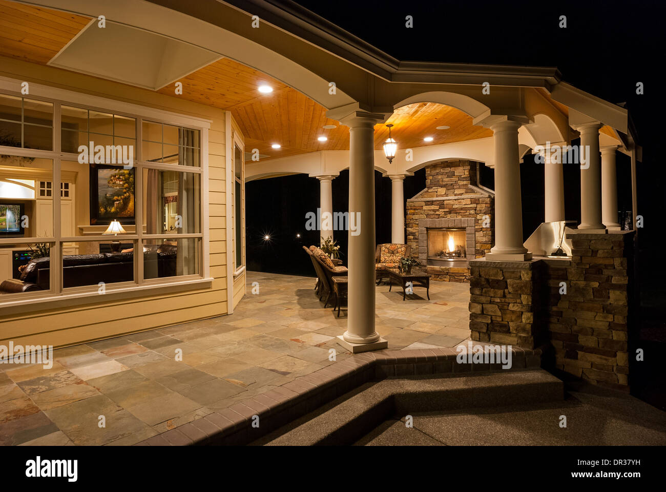 Exterior view of outdoor room at back of luxury home with view of ...