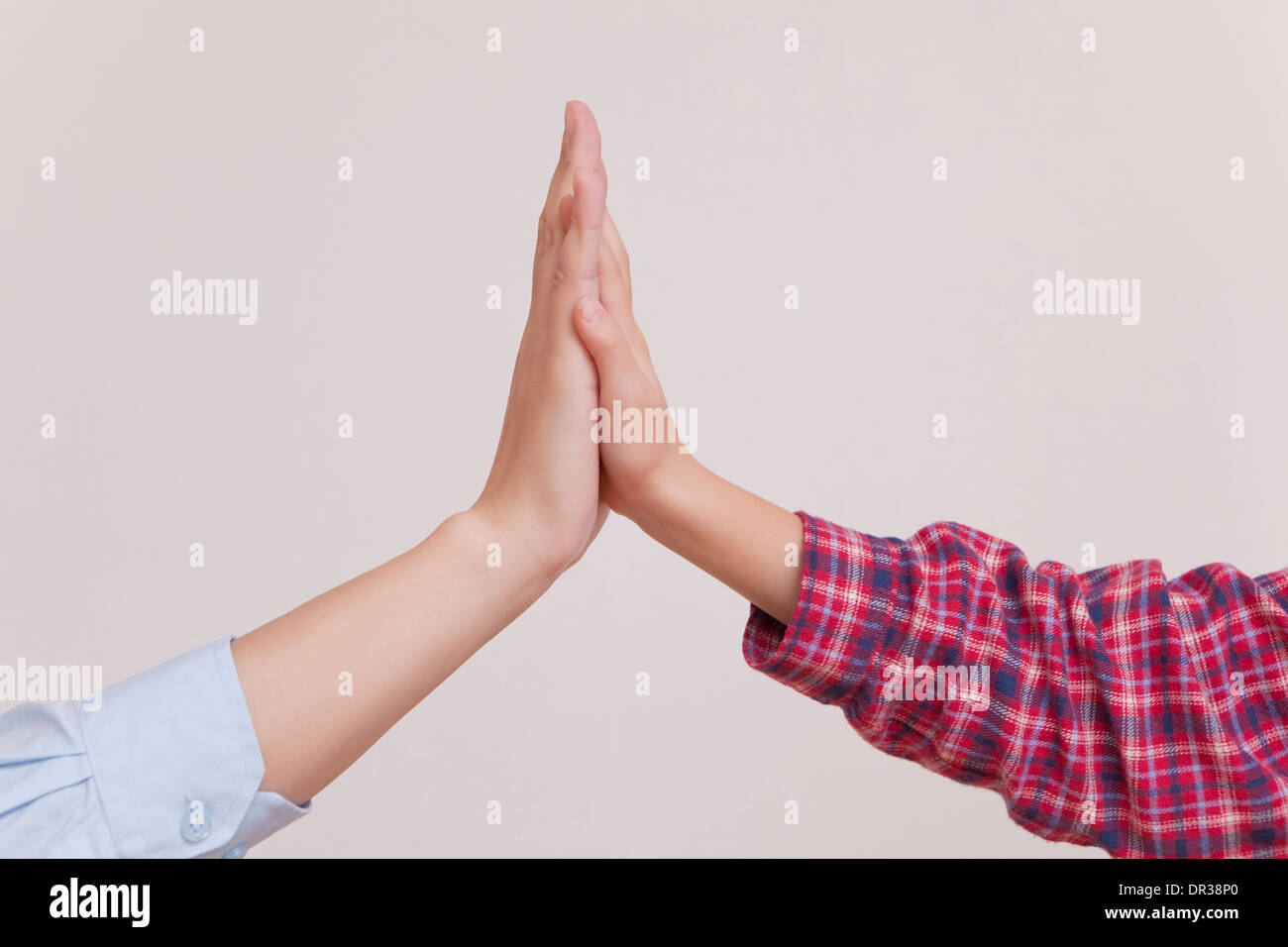 Two boys high five hi-res stock photography and images - Alamy