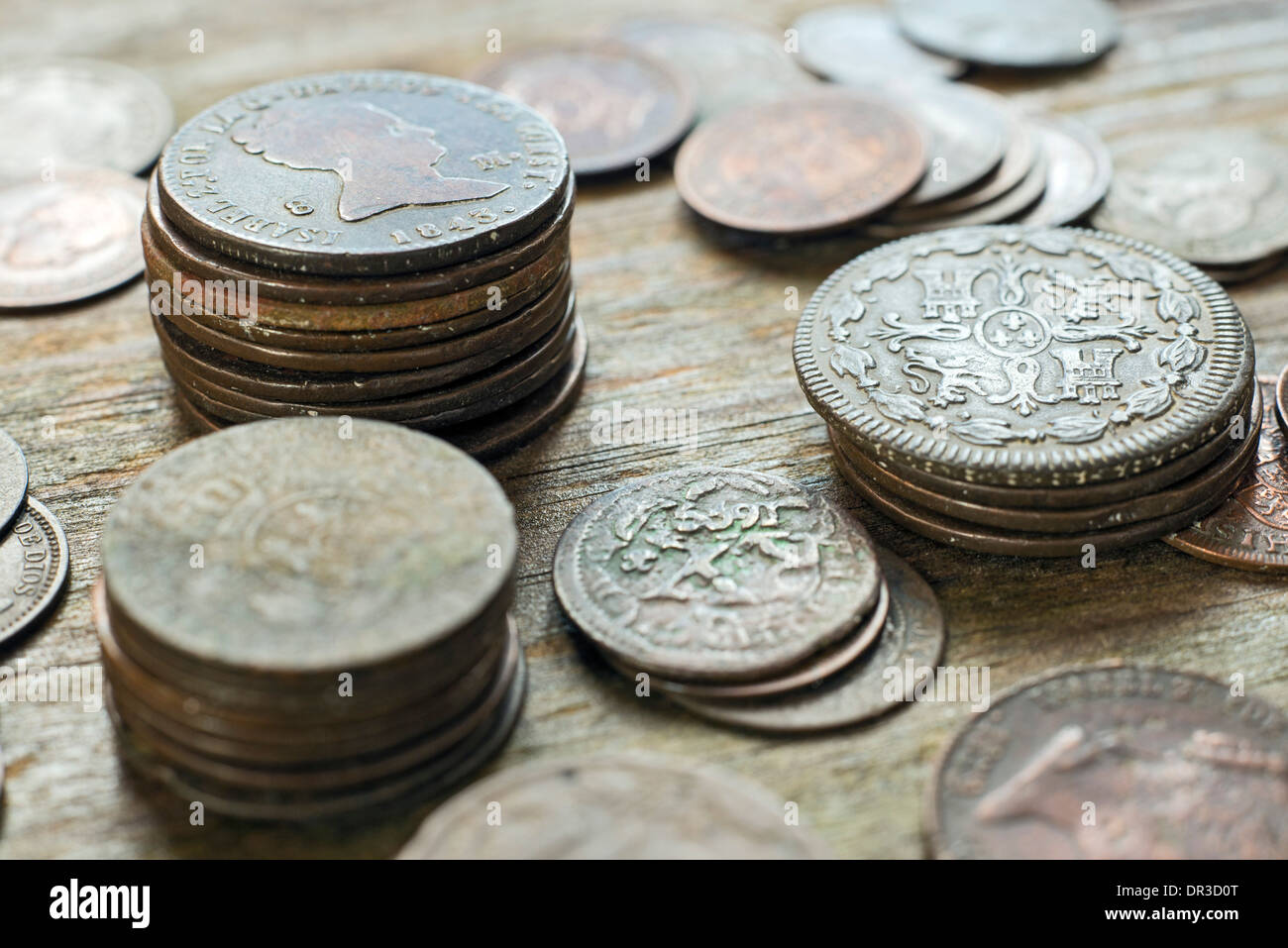 Old copper coins stacked on wood Stock Photo - Alamy