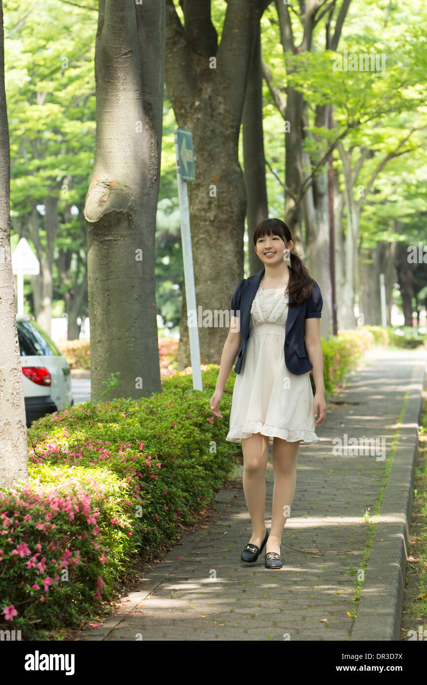 Asian women walking street hi-res stock photography and images - Alamy