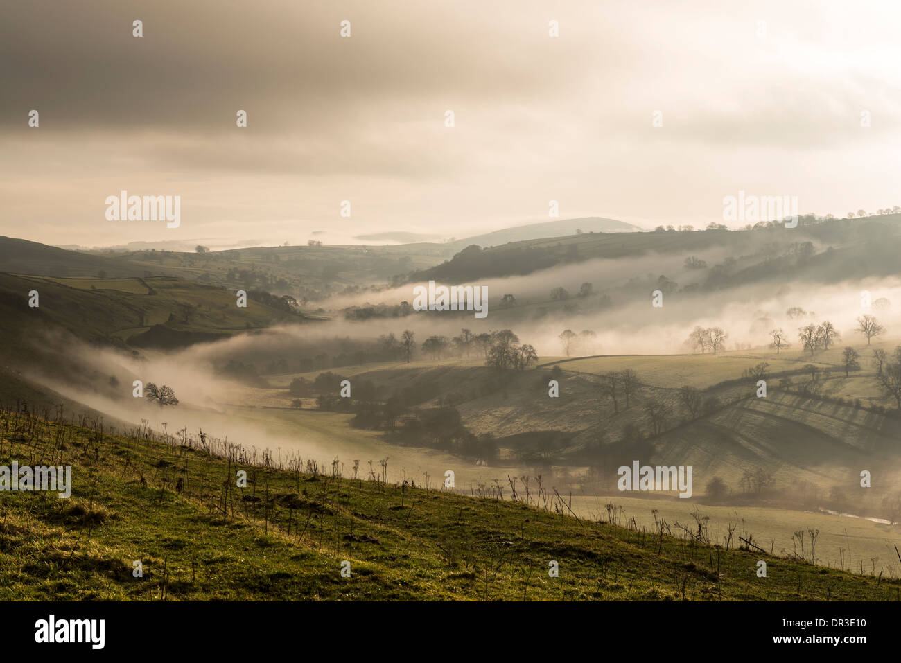 Mist lying in the Upper Dove Valley. Looking towards Pilsbury from ...