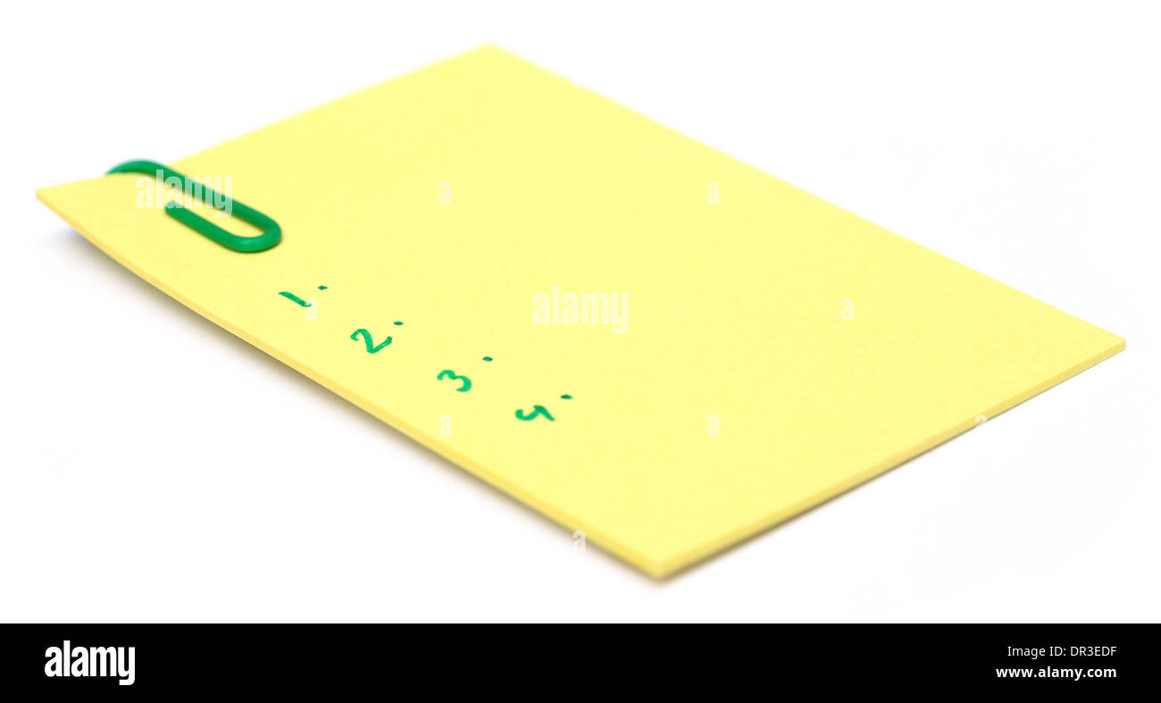 Notepad with paper clip over white background Stock Photo - Alamy