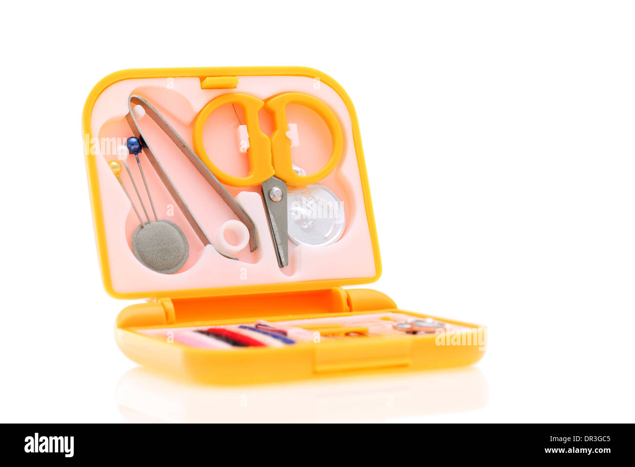 sewing kit on white background Stock Photo - Alamy