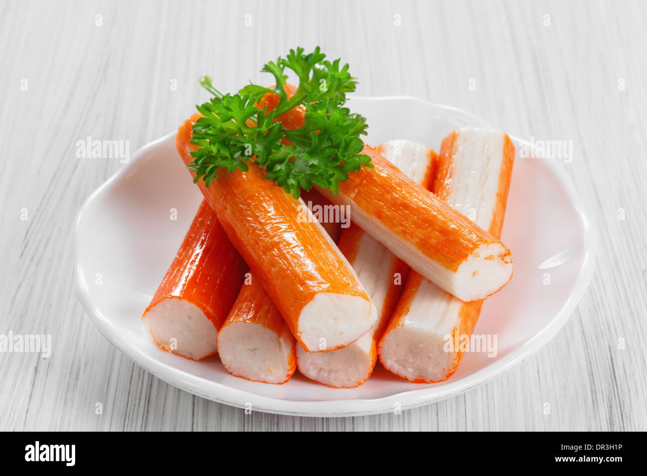 Crab sticks on a platter Stock Photo - Alamy