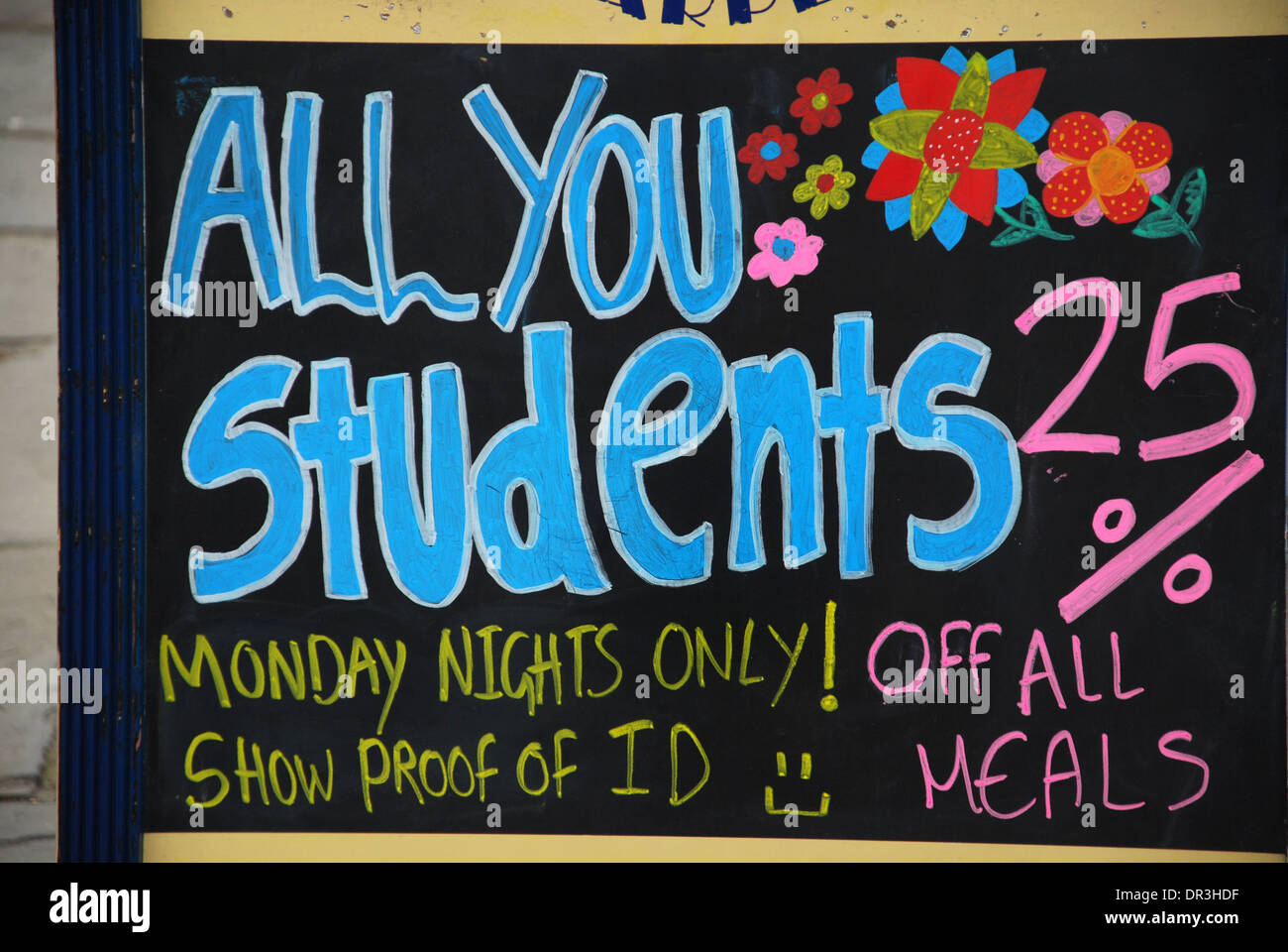 Pub promotion sign for students, Bath UK Stock Photo - Alamy