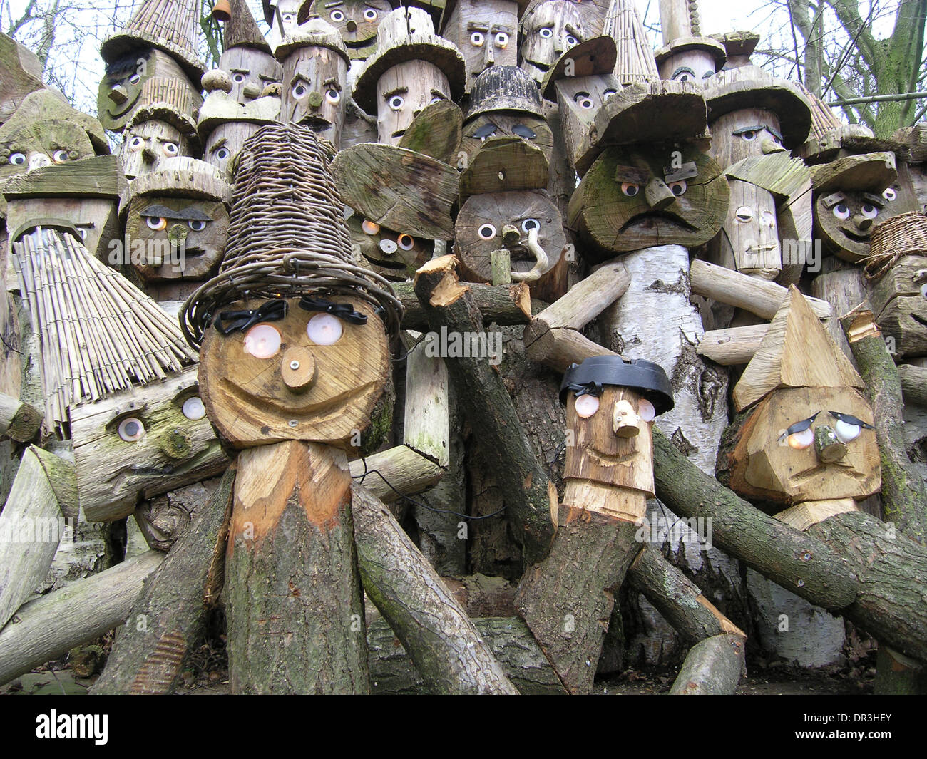 wooden crowd of funny faces Stock Photo - Alamy
