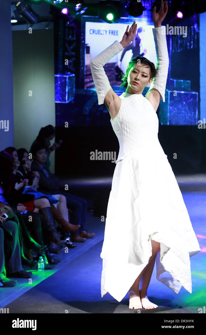 Beijing, China. 19th Jan, 2014. A model presents a creation by American ...
