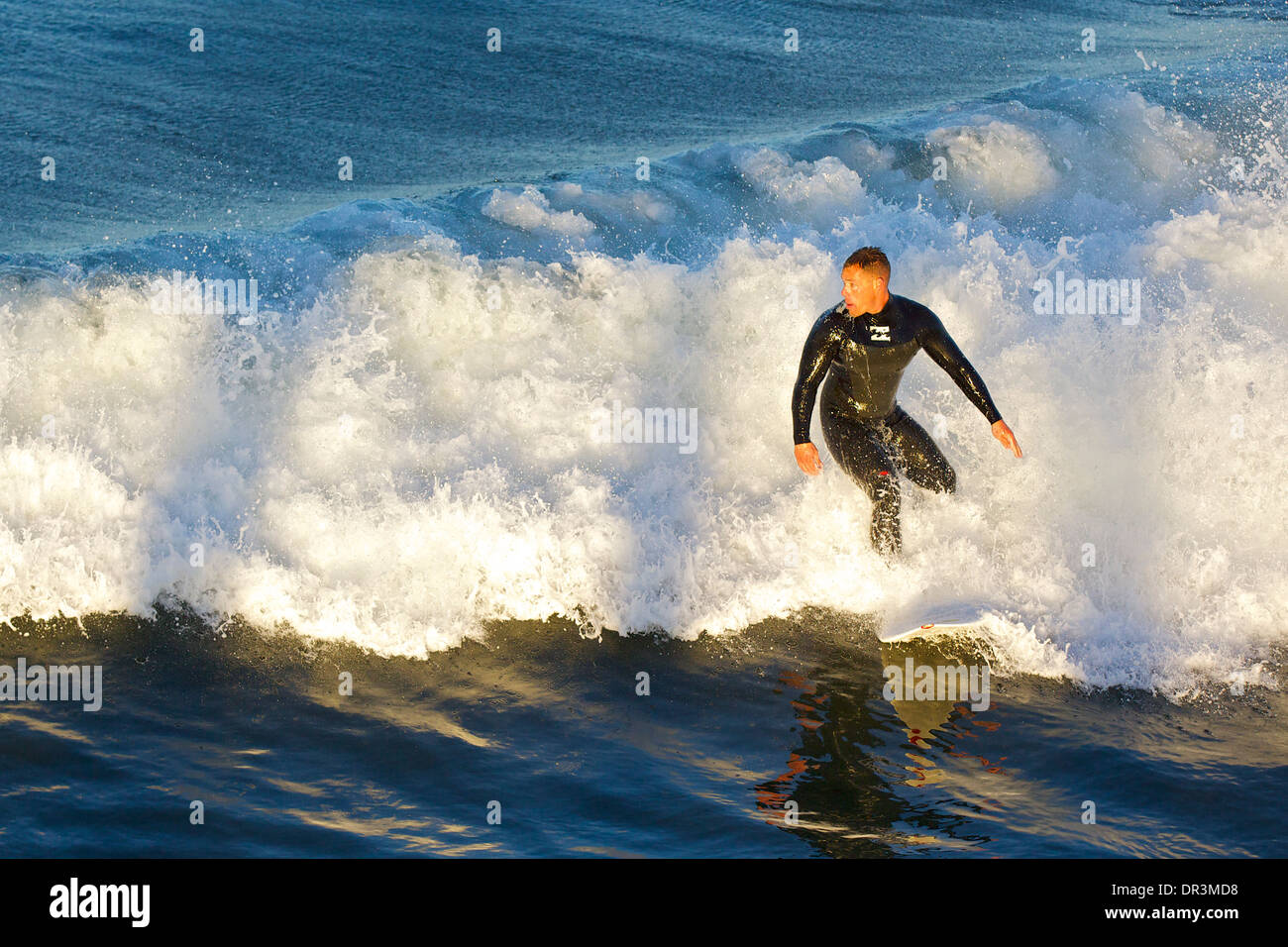 Side profile of a man surfing hi-res stock photography and images - Alamy