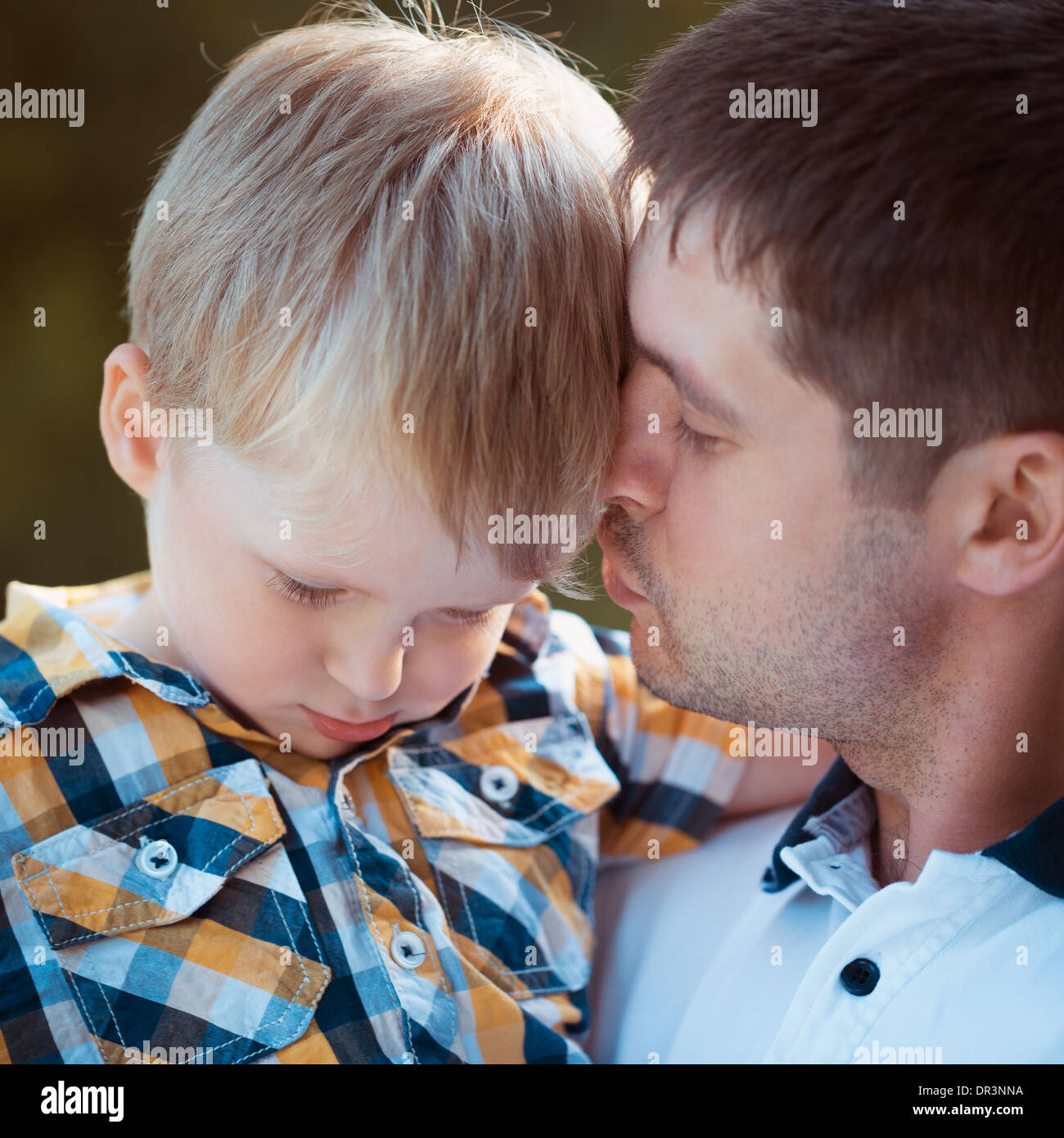 Happy father and his baby son having fun in the park outdoor Stock ...