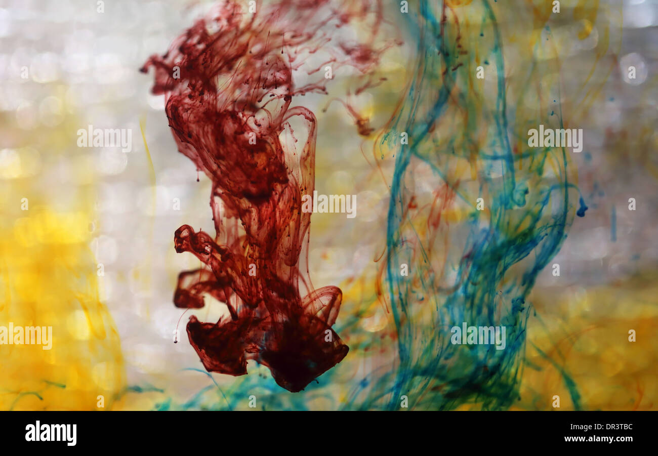 Falling colors in transparent water Stock Photo - Alamy