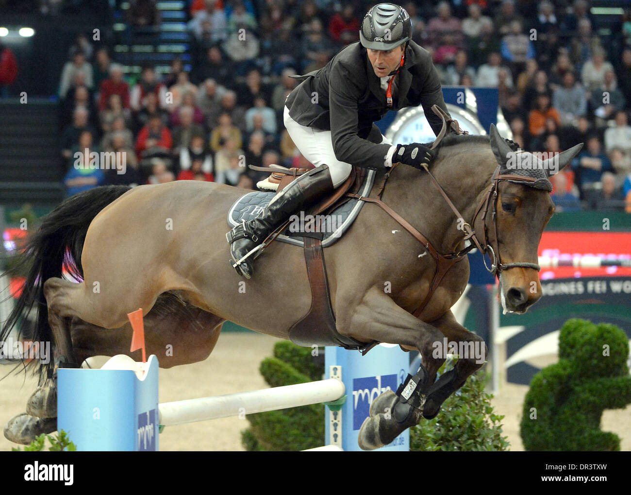 Leipzig, Germany. 19th Jan, 2014. French show jumper Patrice Delaveau ...