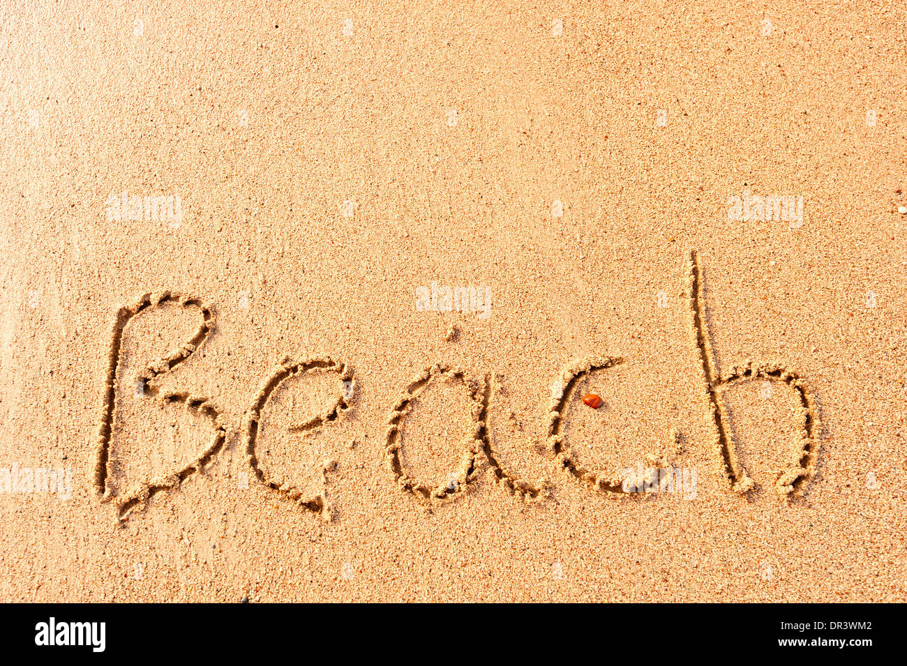 word written on beach wet sand Stock Photo - Alamy