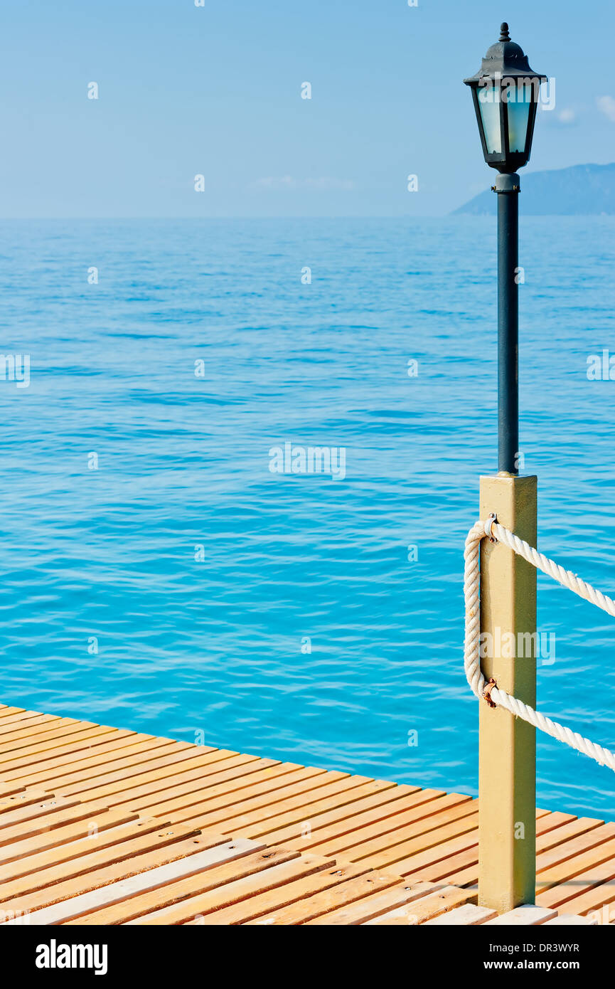 lighting pole on a wooden pier Stock Photo - Alamy