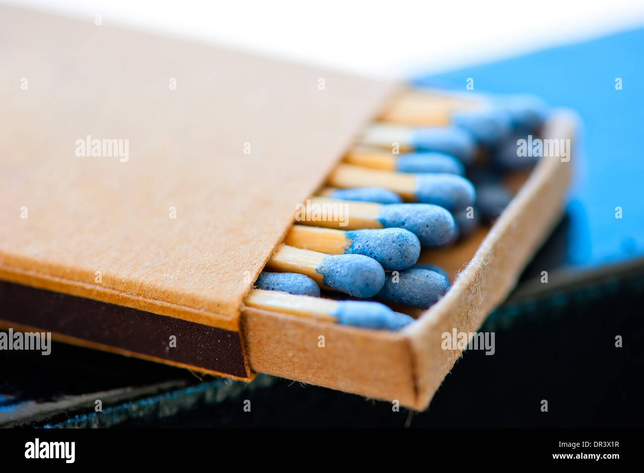 matchbox with blue heads Stock Photo - Alamy