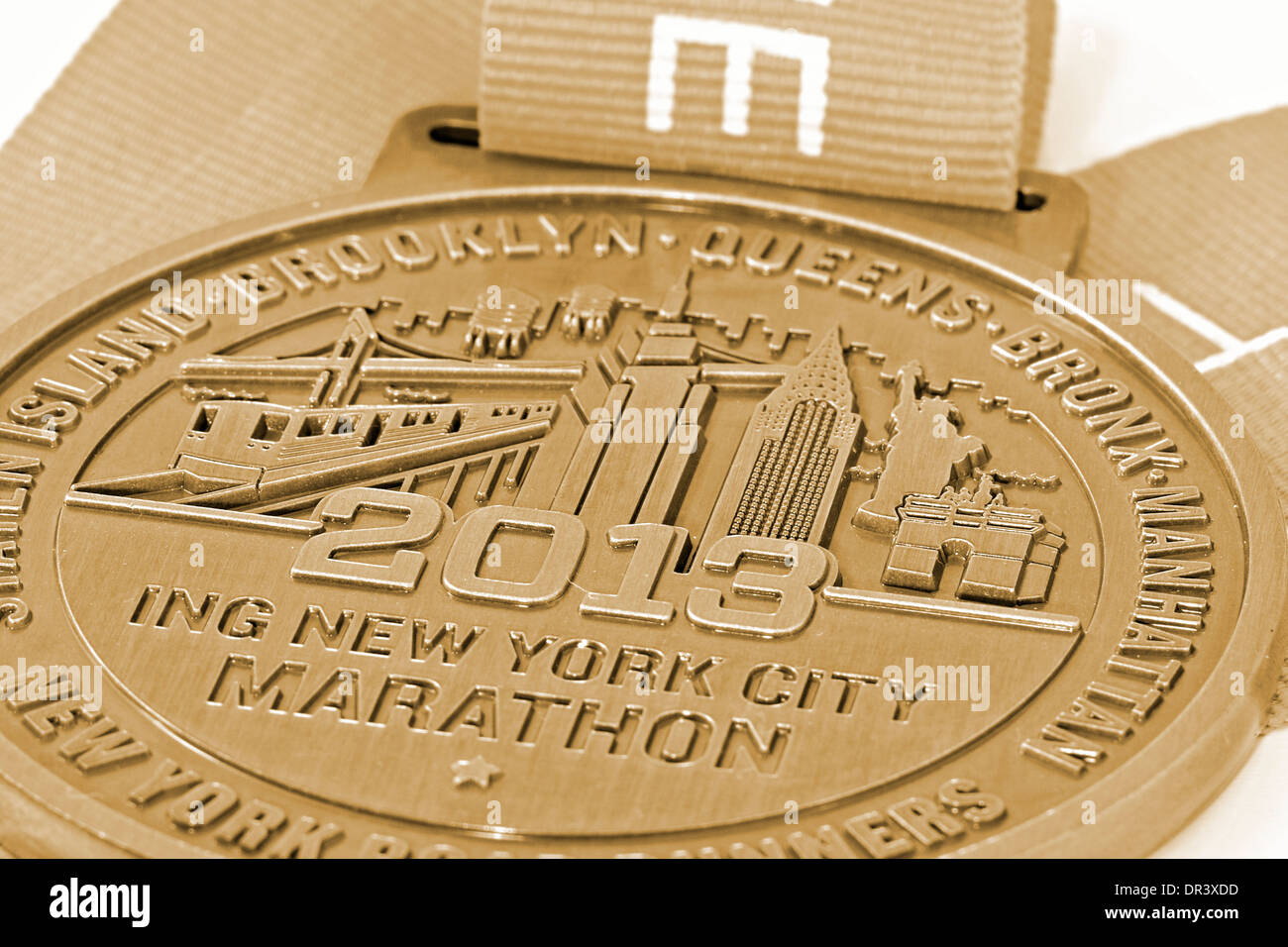 ING New York City Marathon 2013 Finisher Medal Stock Photo - Alamy