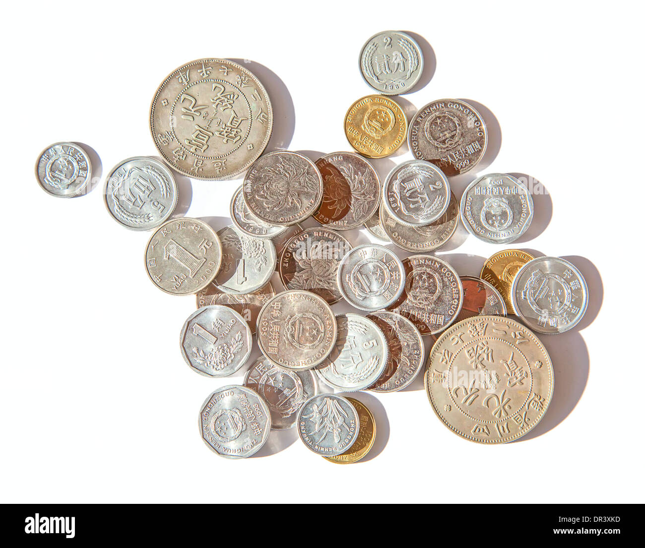 Ancient chinese silver coins isolated on white Stock Photo - Alamy