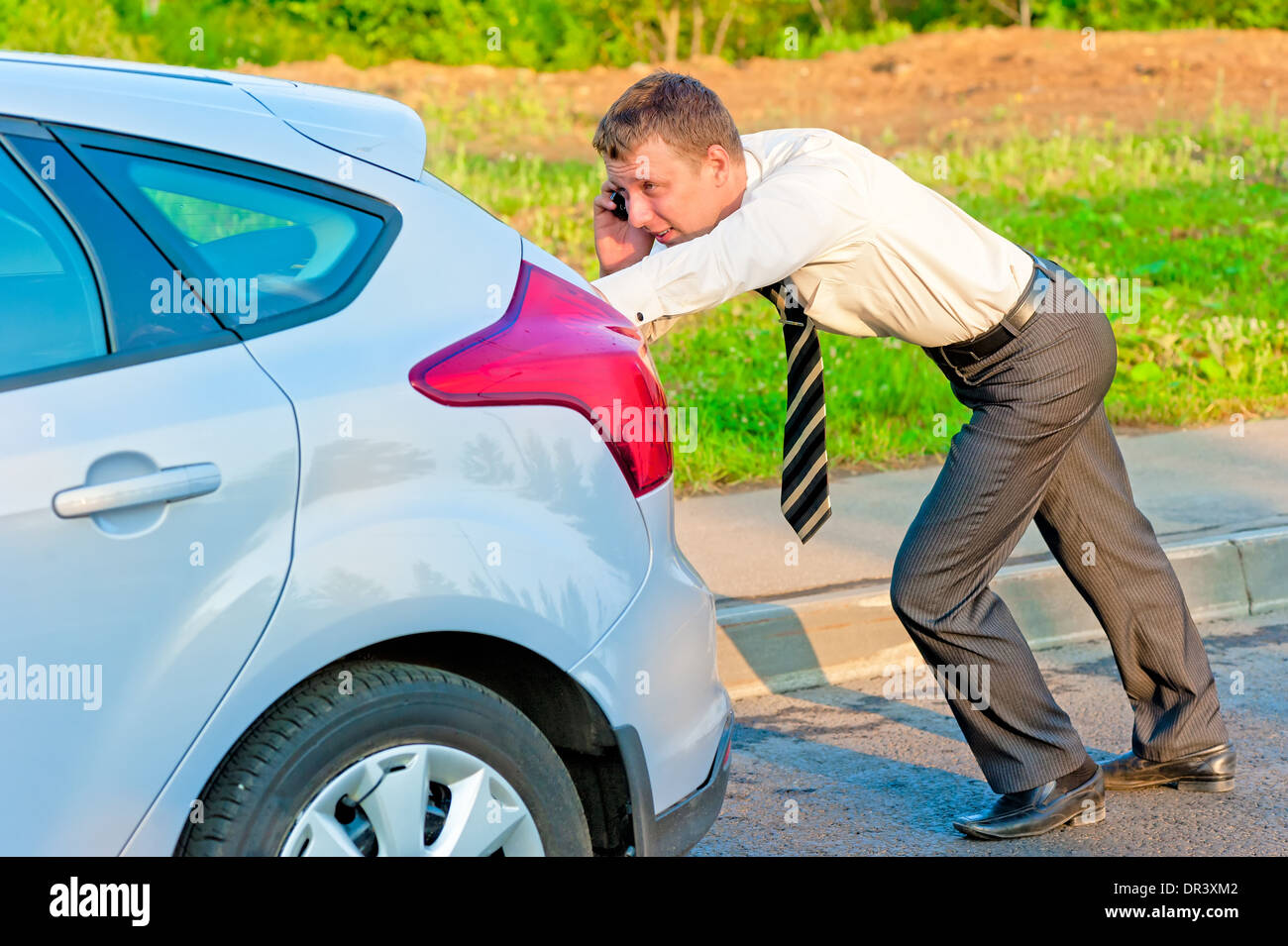 Pushing a car hi-res stock photography and images - Alamy