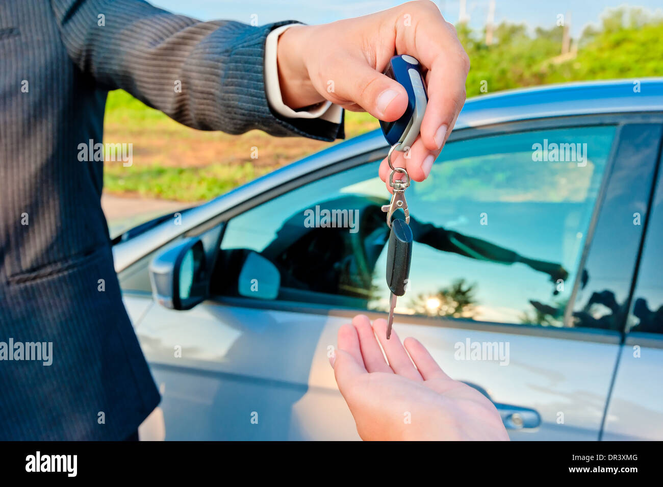Handing of keys hi-res stock photography and images - Alamy