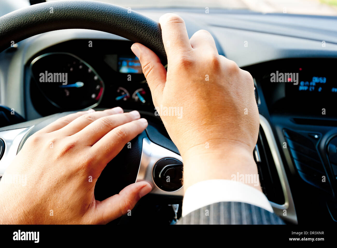 male hand holding a car wheel Stock Photo - Alamy