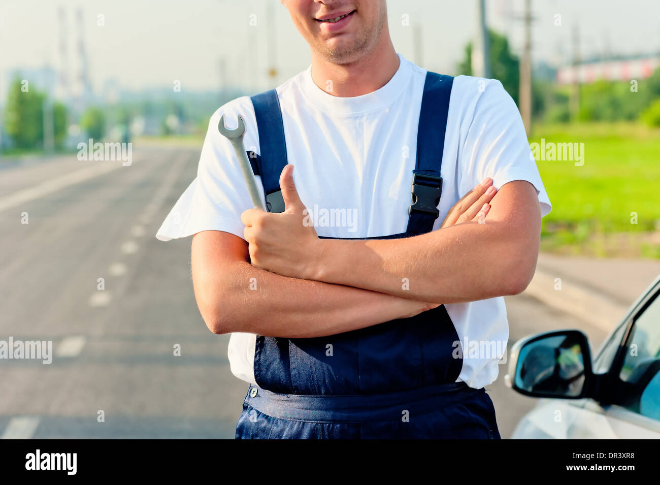 Man standing beside equipment hi-res stock photography and images - Alamy