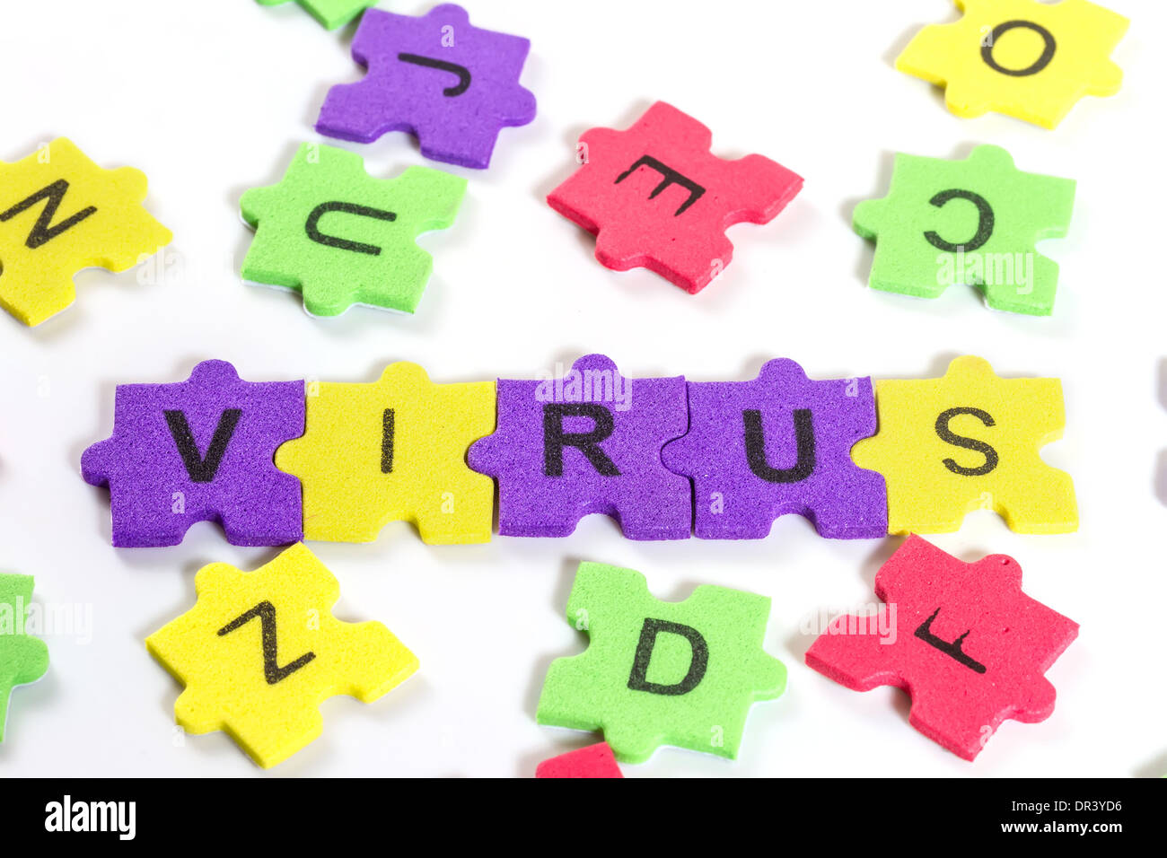 word VIRUS formed with colorful foam puzzle on white background Stock ...
