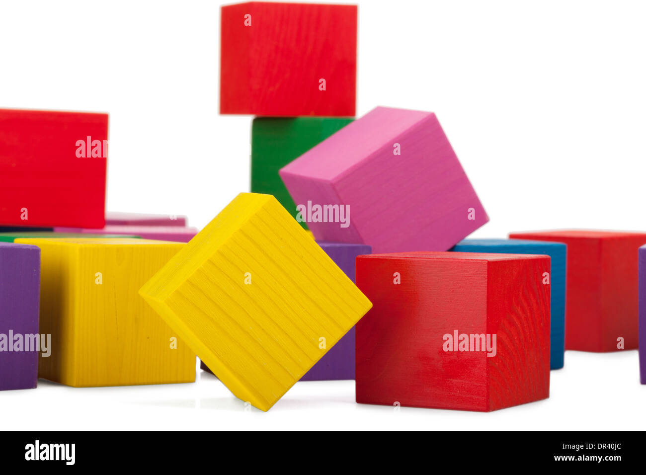 Wooden blocks, stack of colorful cubes, childrens toy isolated on white ...