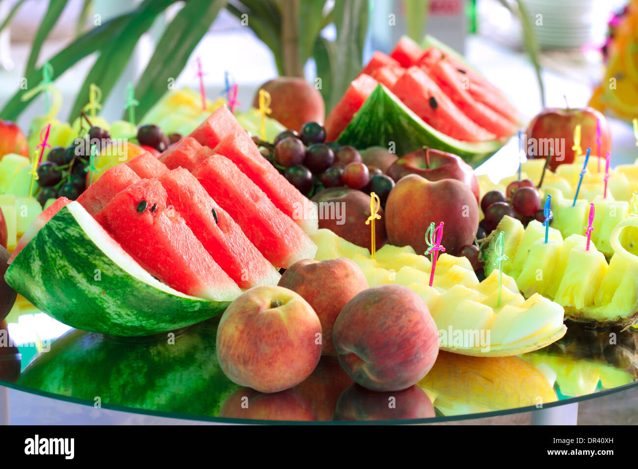 Various slices of fruits on the mirror stand prepared for eating Stock ...