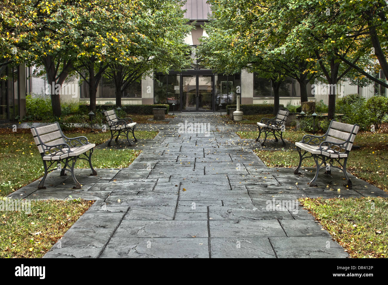 HDR of a business courtyard with benches Stock Photo - Alamy