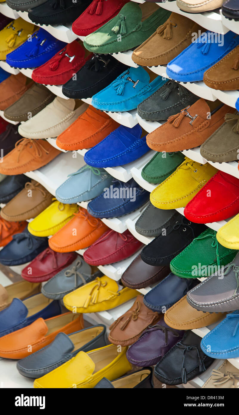 variety of the colorful leather shoes in the shop Stock Photo - Alamy